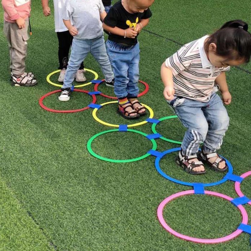 Juego de anillos de círculo de salto de rayuela para niños » Michollo.com